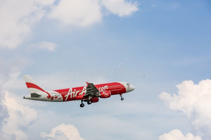 Air Asia Plane Flying in Sky Editorial Photography - Image of airplane ...
