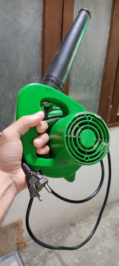 Air Blower in Hand, Air Blower is Used To Remove Dust Particles Stock ...