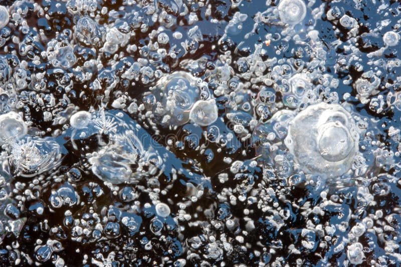 Air Bubbles Captured in Blue Ice Stock Photo - Image of blue, carbon ...
