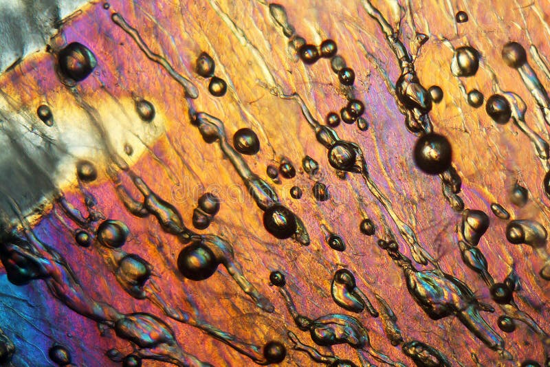 Air Bubbles in Ice Under the Microscope Stock Photo - Image of rainbow ...