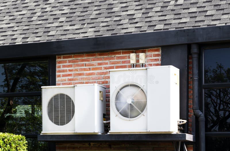 Air Compressor on Brick Wall Building Stock Photo - Image of cooler ...