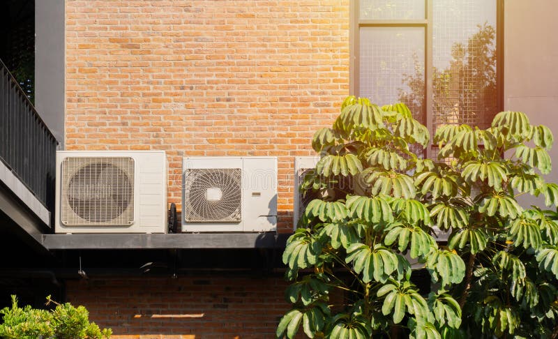 Air Compressor or Air Condenser Unit Located on Support Outside Stock ...