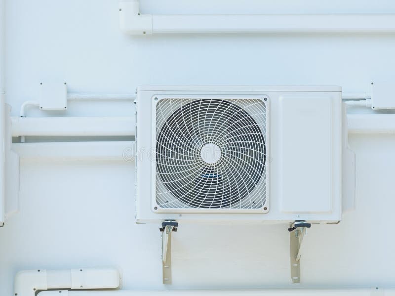 Air Compressor Hanging on the White Wall Stock Image - Image of ...