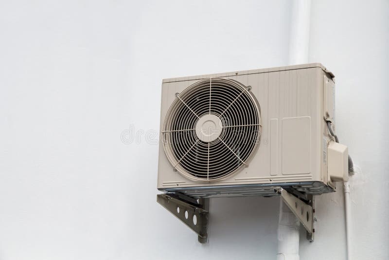Air Compressor on Wall Pedestal with Siding Factory Wall Background ...