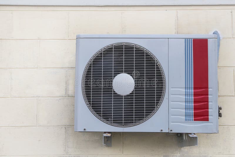 Air Compressor on Wall Pedestal with Siding Factory Wall Background ...