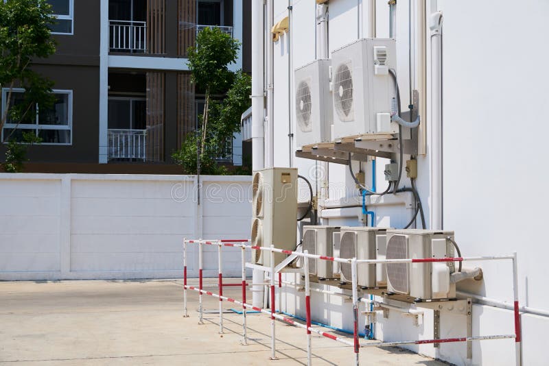 Compressors are Installed on the Outside Wall of the Building Stock ...