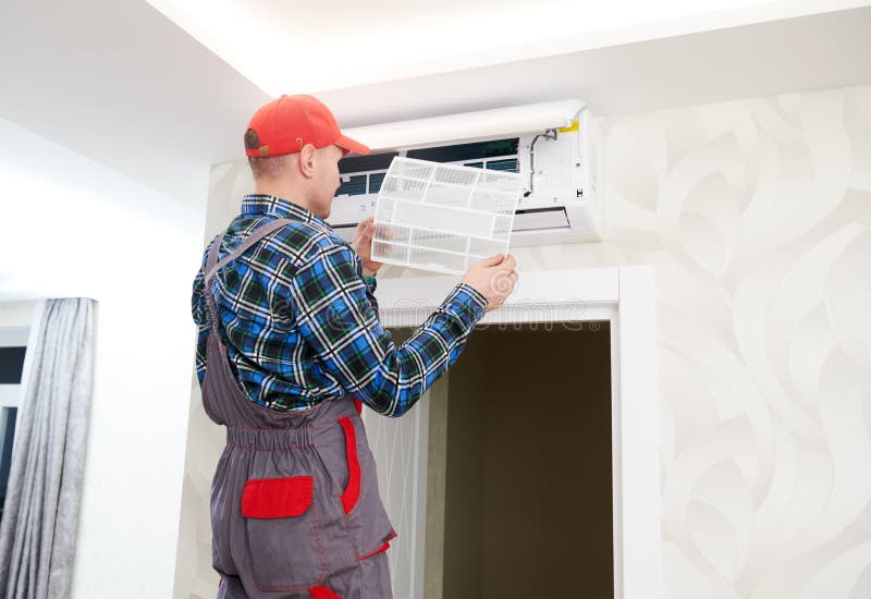 Air Conditioner Service. Check and Replace the Filter for Cleaning ...