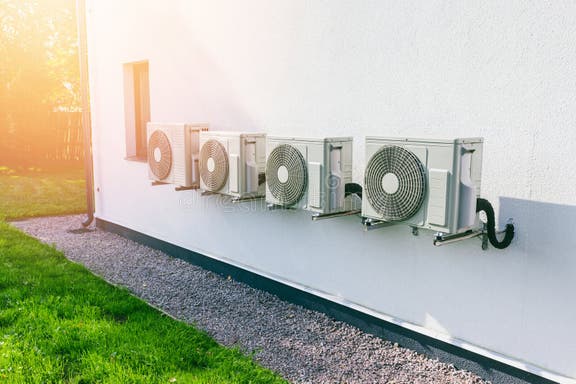 Air Conditioner Compressor Installed in Modern House. Air Conditioning ...