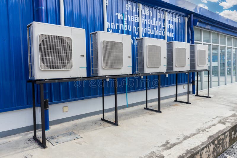 Air Conditioner Compressor Installed in Old Building. Outdoor Split ...