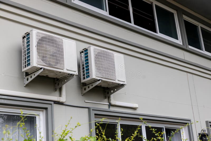 Air Conditioner Compressor Installed in Old Building. Outdoor Split ...