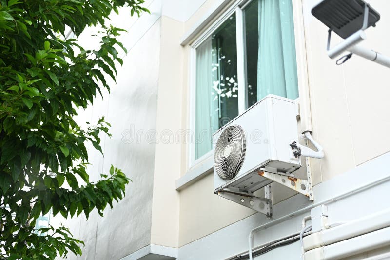 Air Conditioner Compressor Installed Outside the House Stock Photo ...