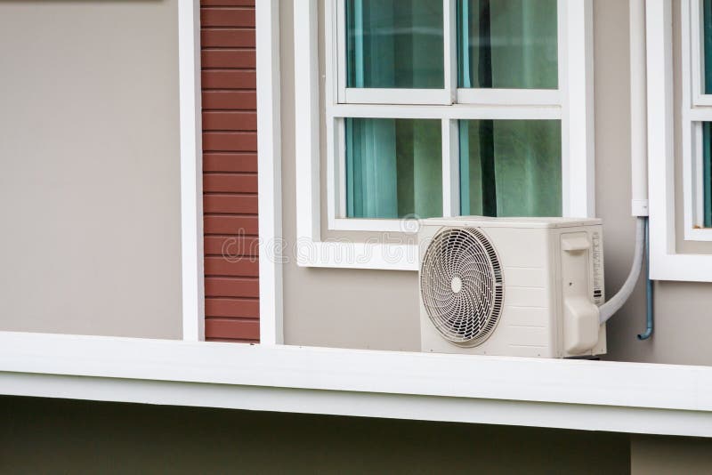 Air Conditioner Compressor Outdoor Unit Installed Outside the House ...