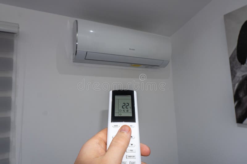 Air Conditioner Inside the Room Operating Remote Controller. Air ...