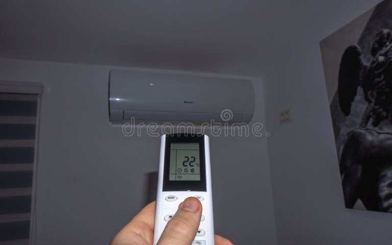 Air Conditioner Inside the Room Operating Remote Controller. Air ...