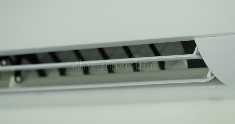 Air Conditioner Operation, Flow Louvers Move Up and Down. Low Angle ...