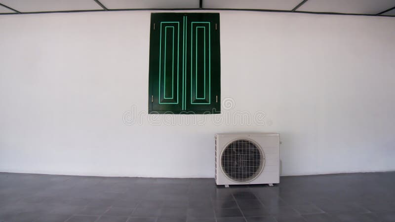 Air Conditioner Outdoor Unit Installed in the Wall Stock Image - Image ...