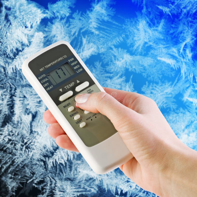 Air Conditioner Remote Control in Hand Stock Photo - Image of electric ...