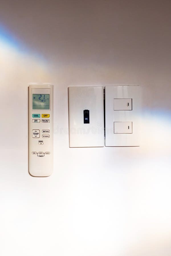 Air Conditioner Remote Control Hanging on Wall Stock Image - Image of ...