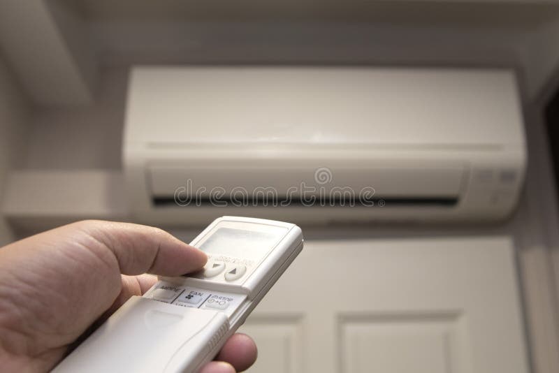 Air Conditioner with the Remote Control Stock Photo - Image of wall ...