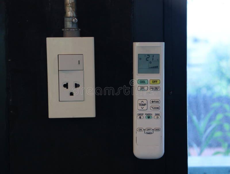 Air Conditioner Remote Control and Light Switch Stock Photo - Image of ...