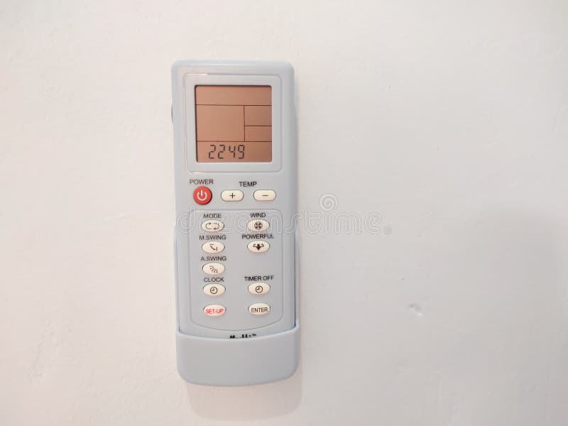 Air Conditioner Remote Control on the Wall Stock Photo - Image of ...