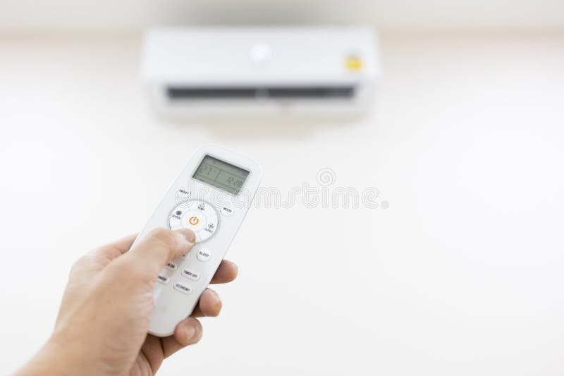 Man Remote Controller Adjusting Temperature Stock Photos - Free ...