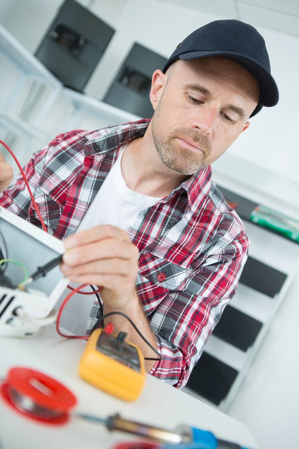 Air Conditioner Repair Man at Work Stock Image - Image of commercial ...