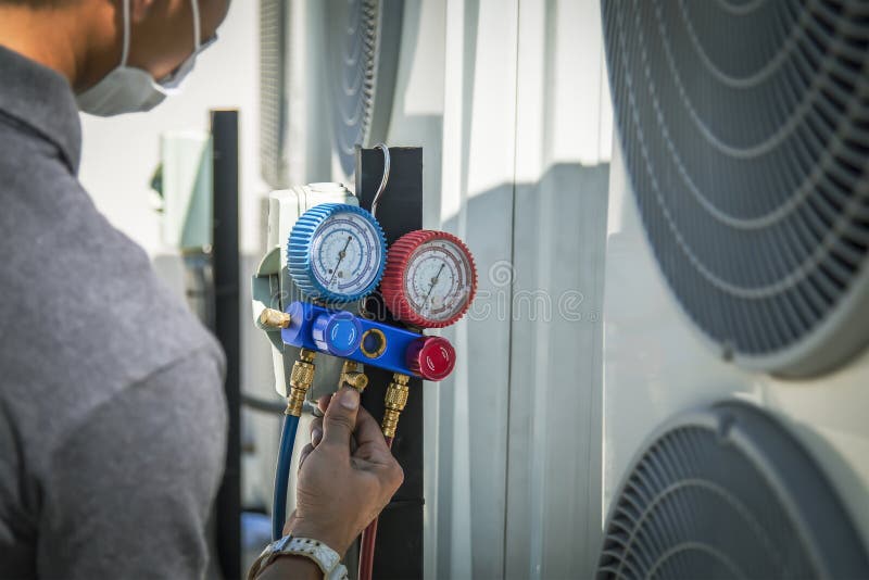 Air Conditioner Technician Checking Air Conditioner Operation Stock ...