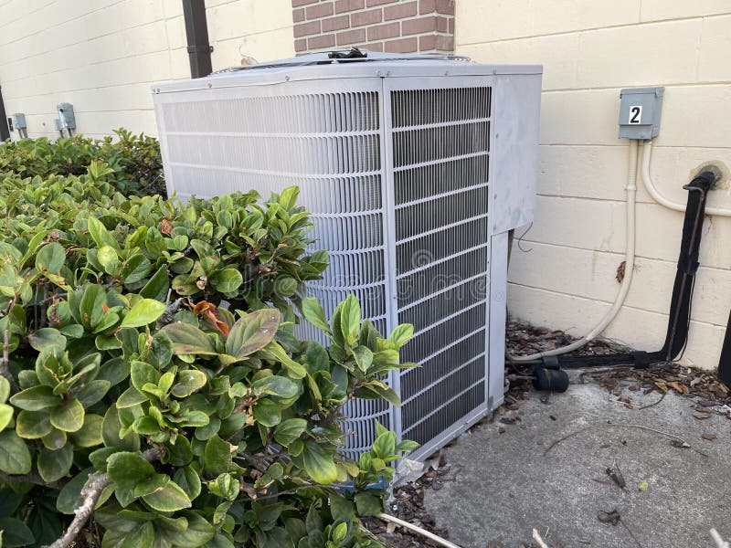 Air Conditioner Unit Exterior Side View Wall Outlet and Bush Stock ...