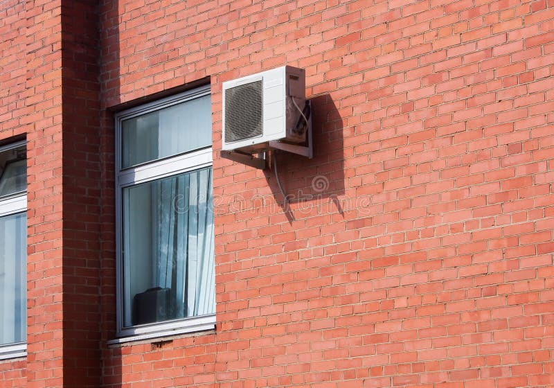 Air Conditioning on a Brick Wall Stock Image - Image of heat, equal ...