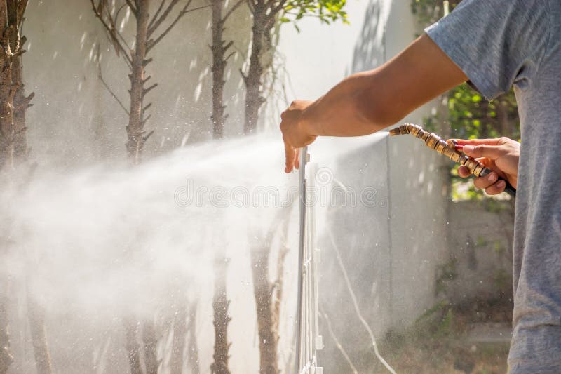Air Conditioning Filter Cleaning with Water Spray Stock Photo - Image ...