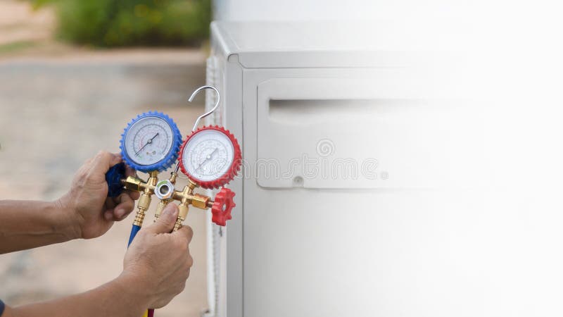 Air Conditioning, HVAC Service Technician Using Gauges To Check ...