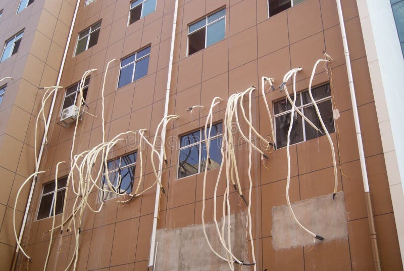 Air Conditioning Pipe Hanging on the Wall, in the Outside the Building ...