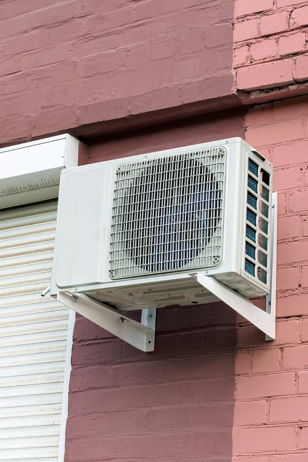 Air Conditioning on Red Brick Building Wall Stock Image - Image of heat ...