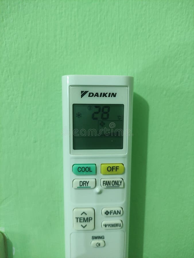 Air Conditioning Remote on the Wall Stock Image - Image of green ...