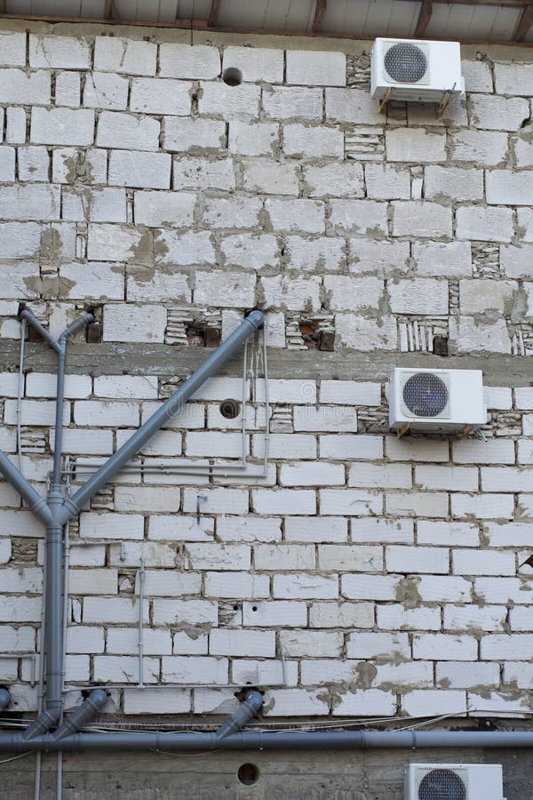 Air Conditioning and Sewage on the Wall Stock Image - Image of domestic ...