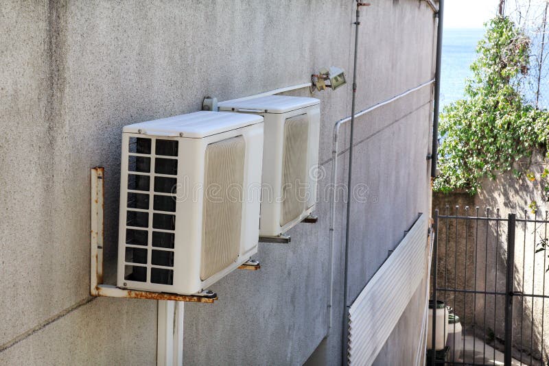 Air Conditioning System Assembled on a Wall of Building / Outdoor ...