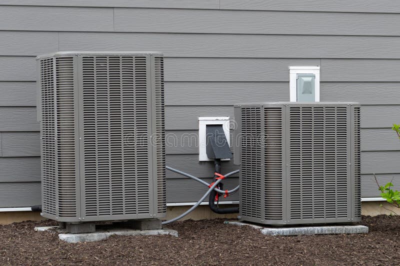 Air Conditioning System Unit Installed Outside of the New House Stock ...