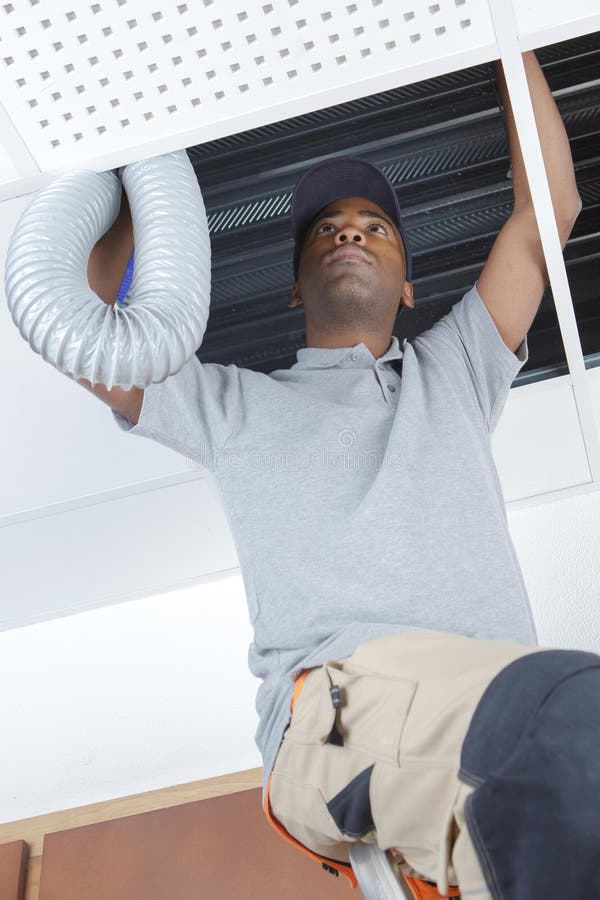 Air Conditioning Technician Stock Photo - Image of compressor ...