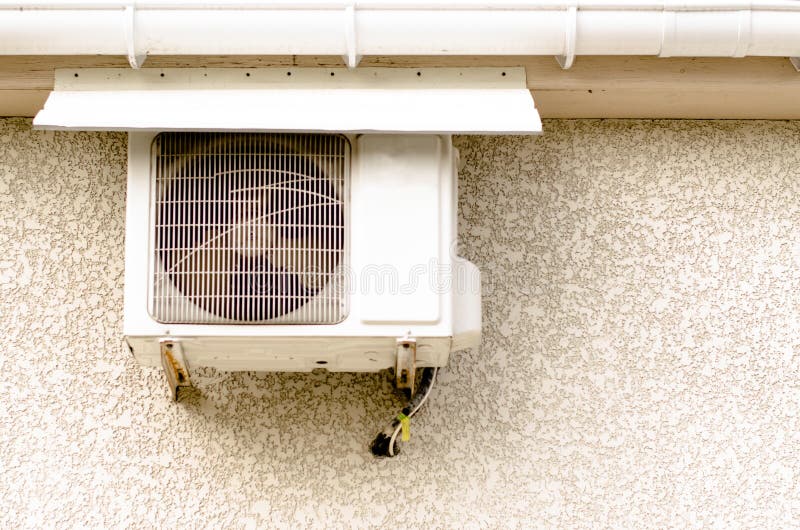 Air Conditioning on the Wall of the Building Outside Stock Image ...