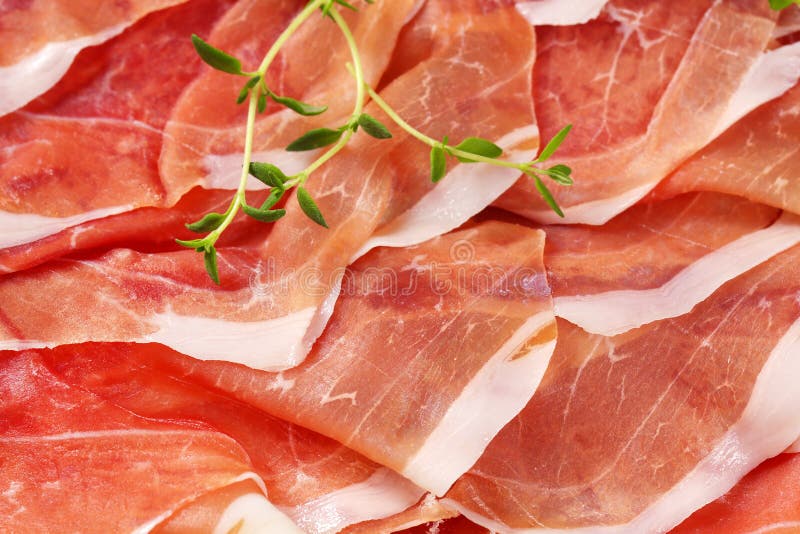Air dried ham with thyme stock photo. Image of cured - 82607792