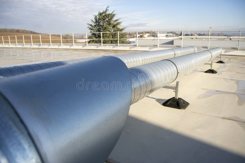 Air Extractor and Ducts on the Roof of a Warehouse Stock Photo - Image ...