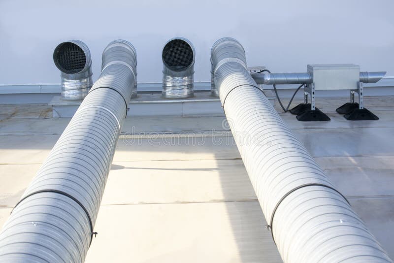 Air Extractor and Ducts on the Roof of a Warehouse Stock Photo - Image ...