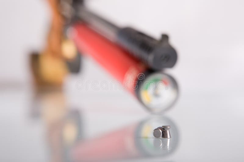 Air gun with two bullets stock photo. Image of danger - 22070072