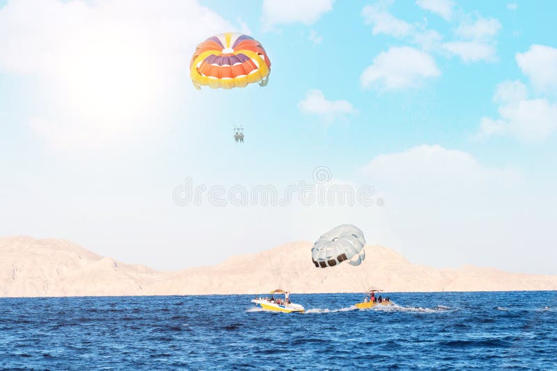 Air Parachute in the Sky. Water Parachute on Three Places. Parasailing ...