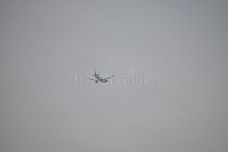 An Air Plain Taking Off in the Clouds during Sunset in India Stock ...