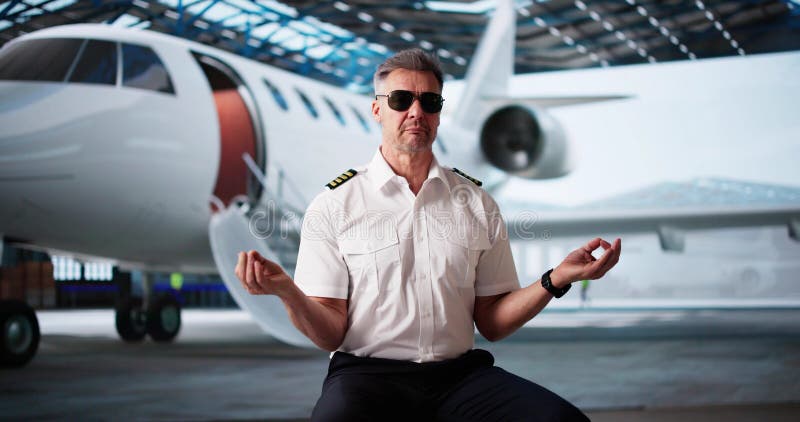 Air Plane Pilot Officer Doing Yoga Meditation Exercise Stock Image ...