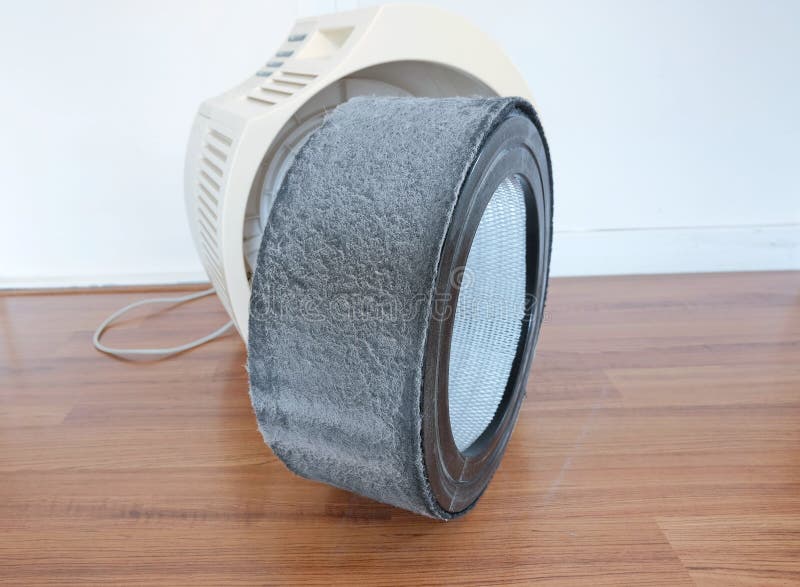 PM 2.5 Air Pollution. Air Purifier Maintenance. the Dirty Filter of Air ...