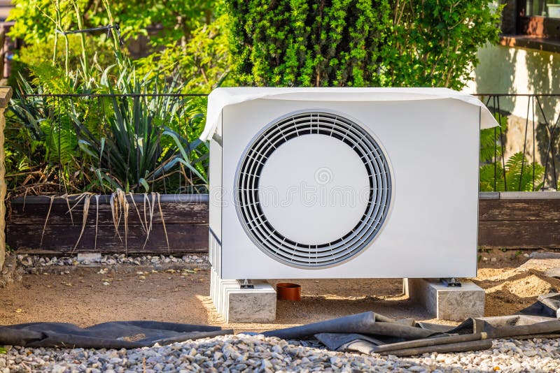 Air Source Heat Pump Installed Outside a House, Green Renewable Energy ...
