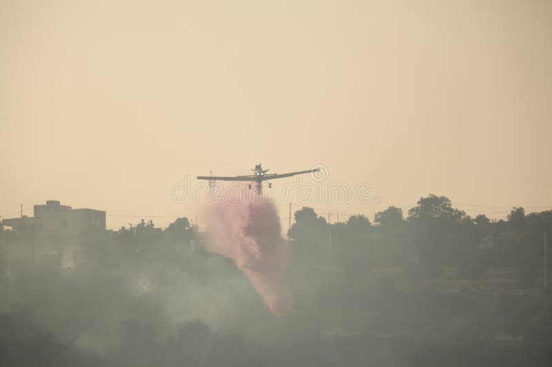 Air Tractor at-802 Fire Fighting Aircraft Puts Out a Forest Fire Stock ...